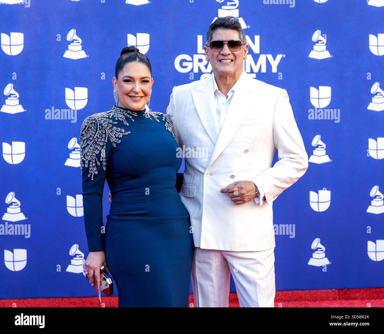 Eddie Herrera (R) and guest attend the Latin Grammy Awards at the MGM ...