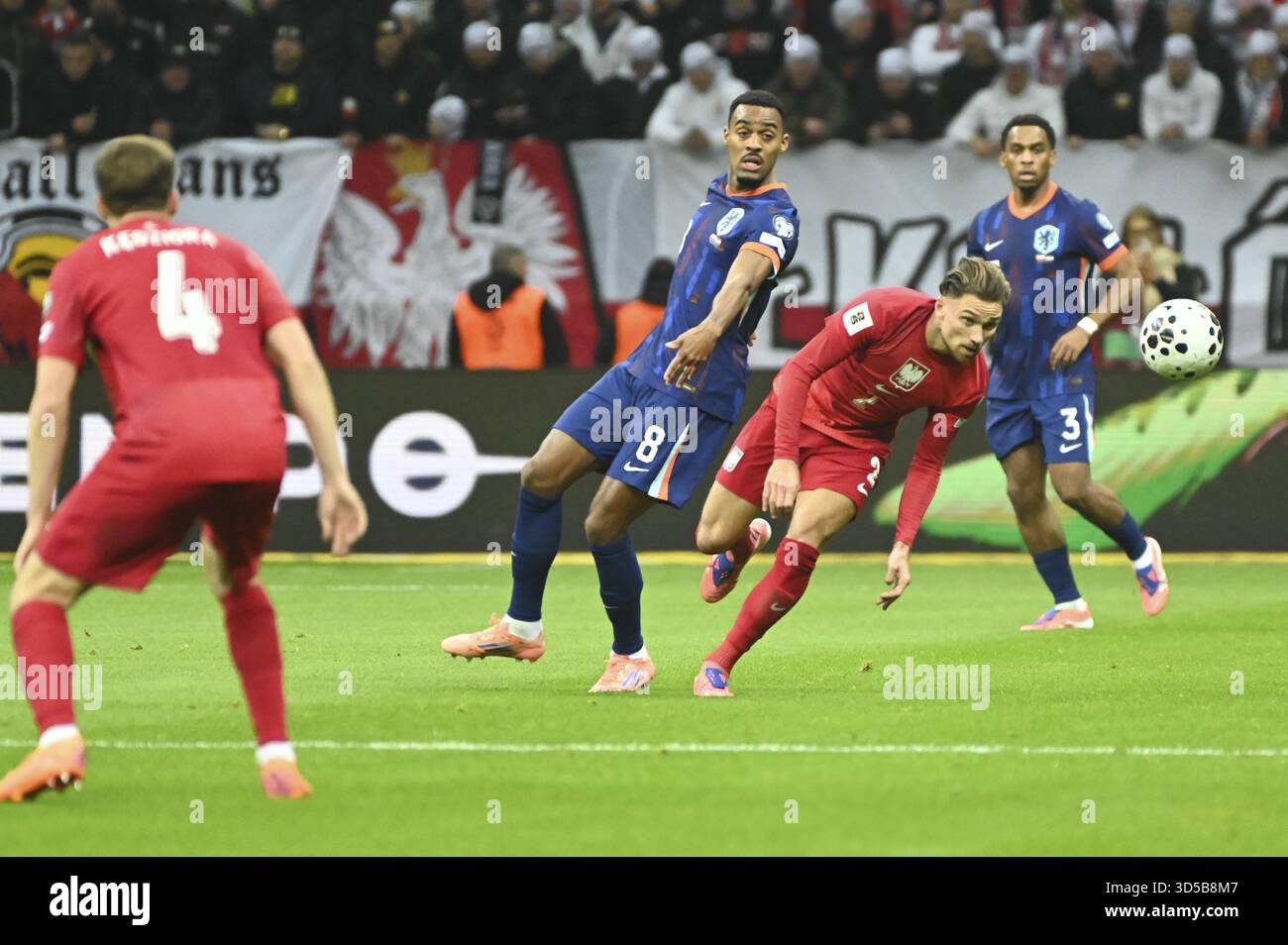 Ryan Gravenberch (HOL), Matty Cash (POL) during the FIFA World Cup 2026 qualifying match between ...