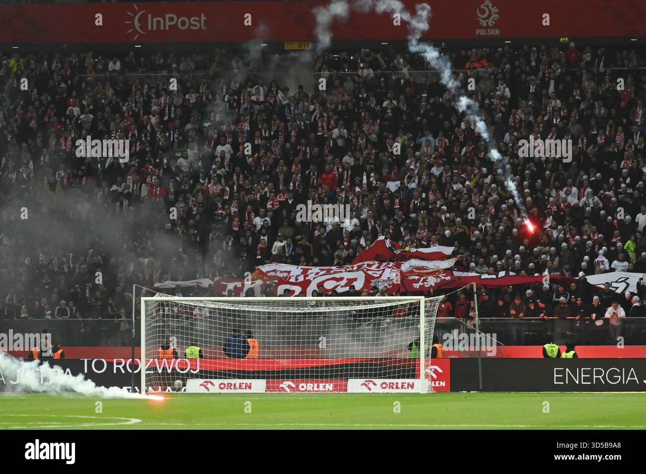 Flares thrown onto the pitch by Polish fans during the FIFA World Cup ...