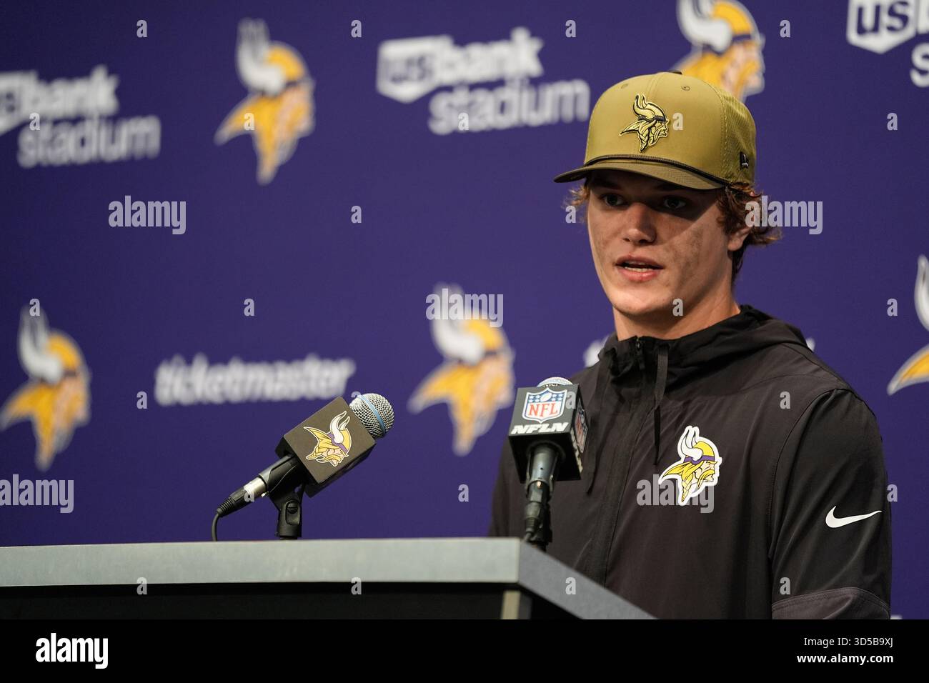 Minnesota Vikings quarterback J.J. McCarthy talks to reporters after an ...