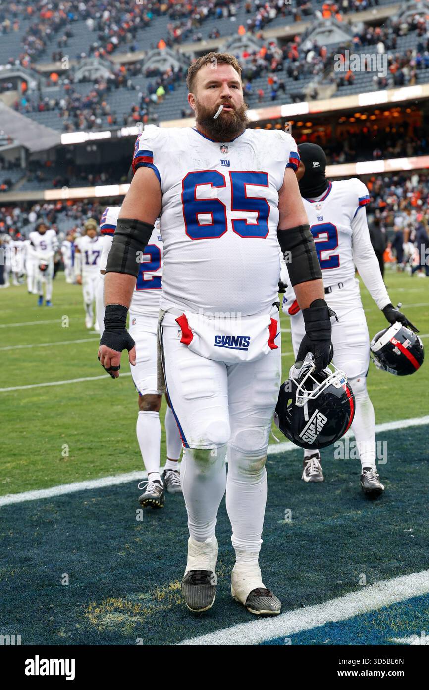 New York Giants center Austin Schlottmann (65) walks off the field ...