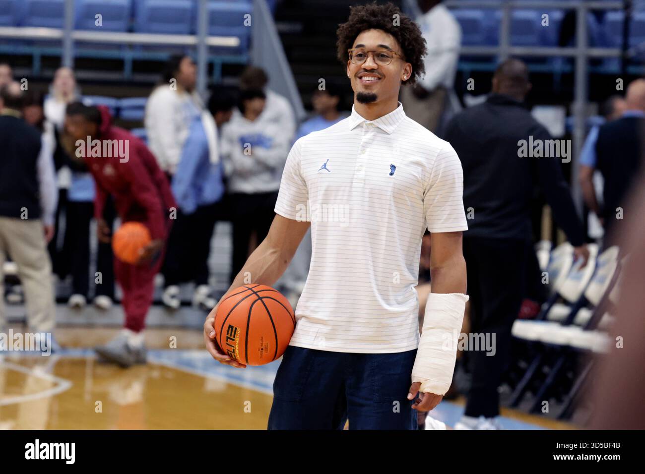 North Carolina guard Seth Trimble watches as the team warms up before ...