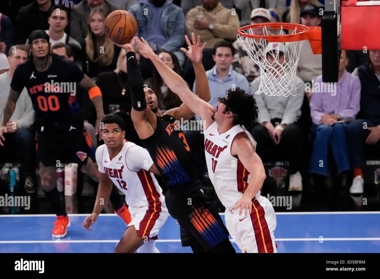 New York Knicks guard Josh Hart (3) shoots over Miami Heat forward ...