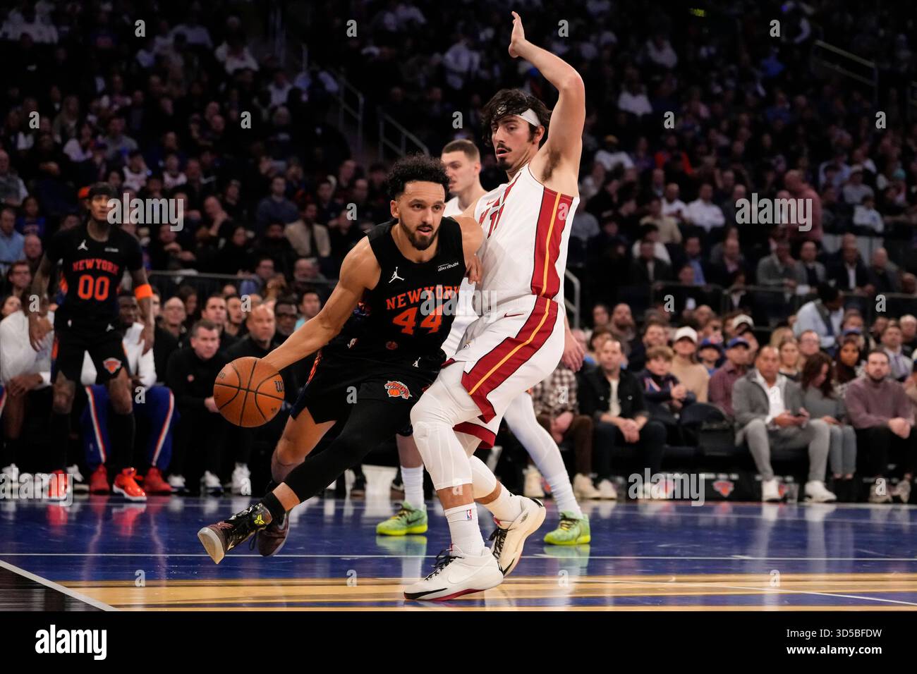 New York Knicks guard Landry Shamet (44) drives past Miami Heat forward ...