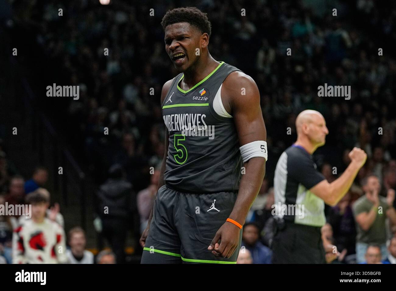 Minnesota Timberwolves guard Anthony Edwards (5) reacts after making a ...