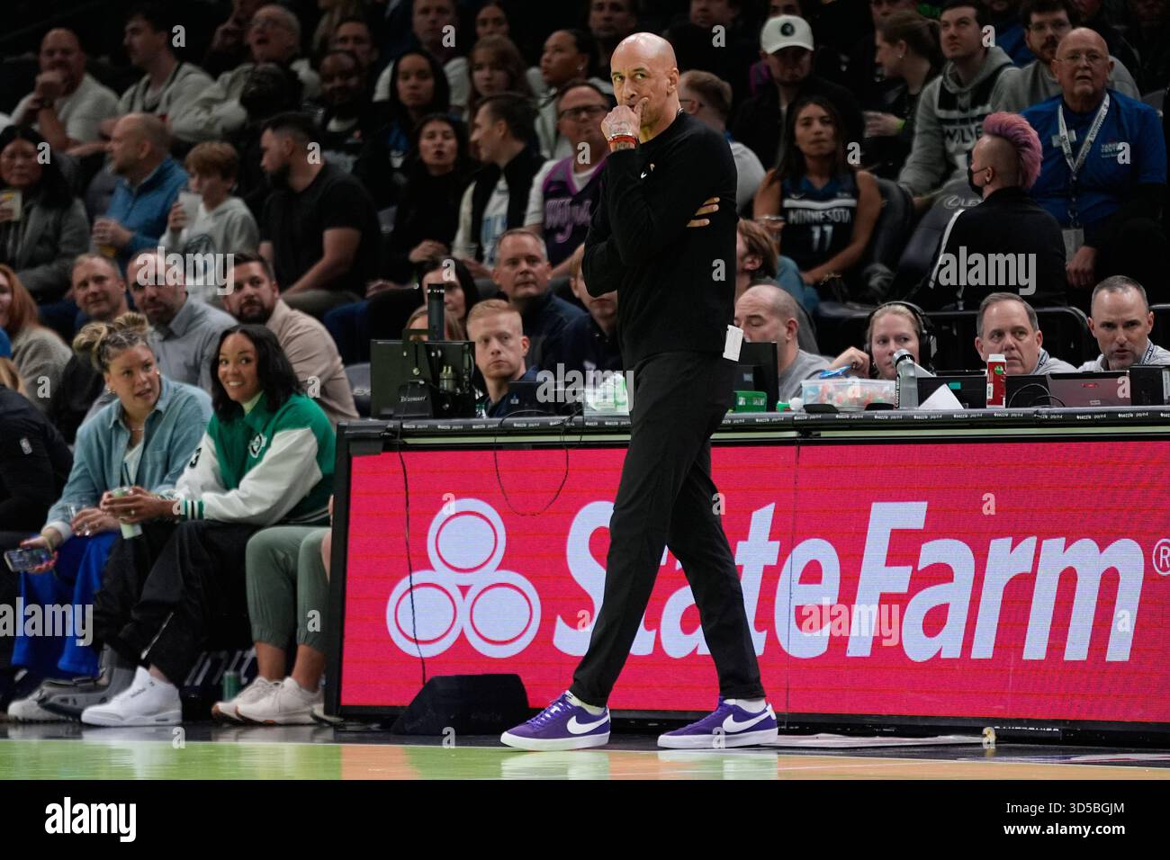 Sacramento Kings head coach Doug Christie stands on the court during ...