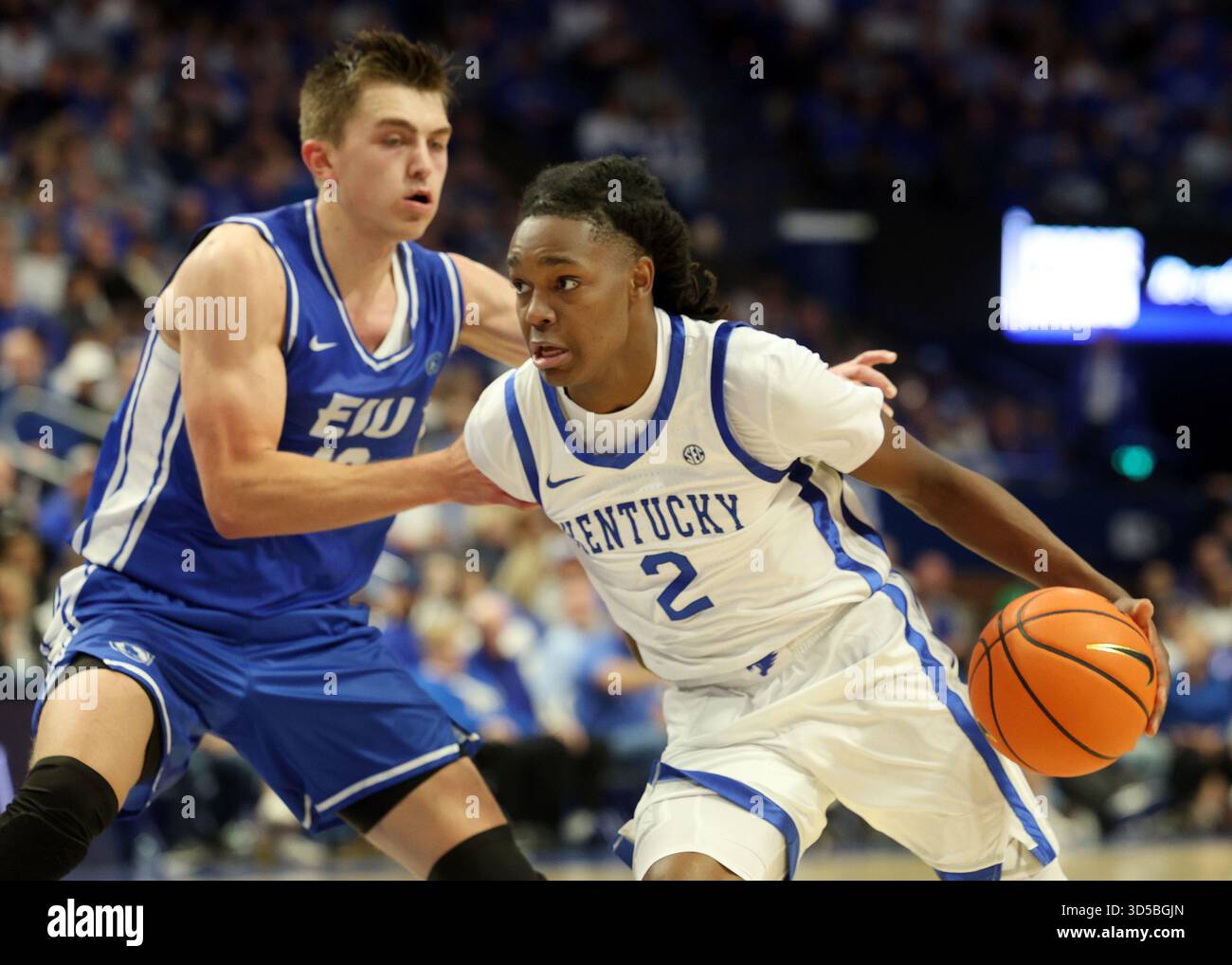 Kentucky's Jasper Johnson (2) drives against Eastern Illinois' Preston ...
