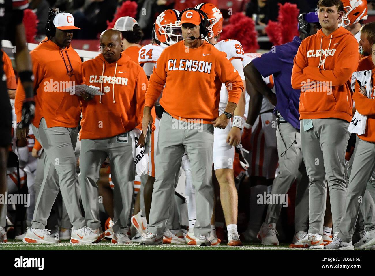 Clemson head coach Dabo Swinney, center, looks on during the first half ...