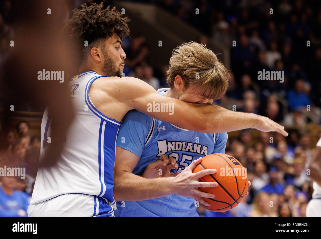 Indiana State's Derek Vorst, right, collides with the arm of Duke's ...