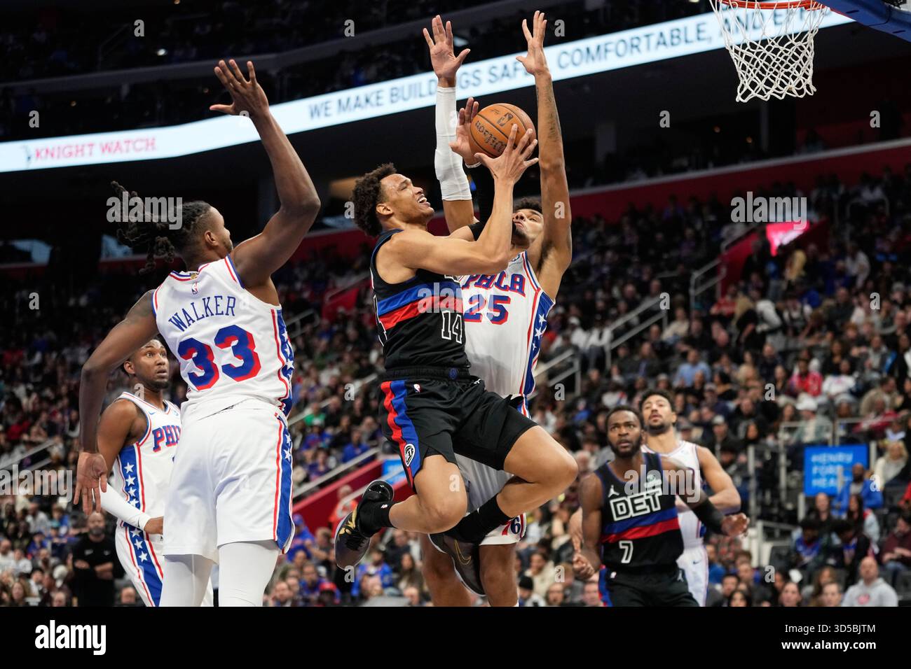 Detroit Pistons guard Wendell Moore Jr., center, shoots against ...