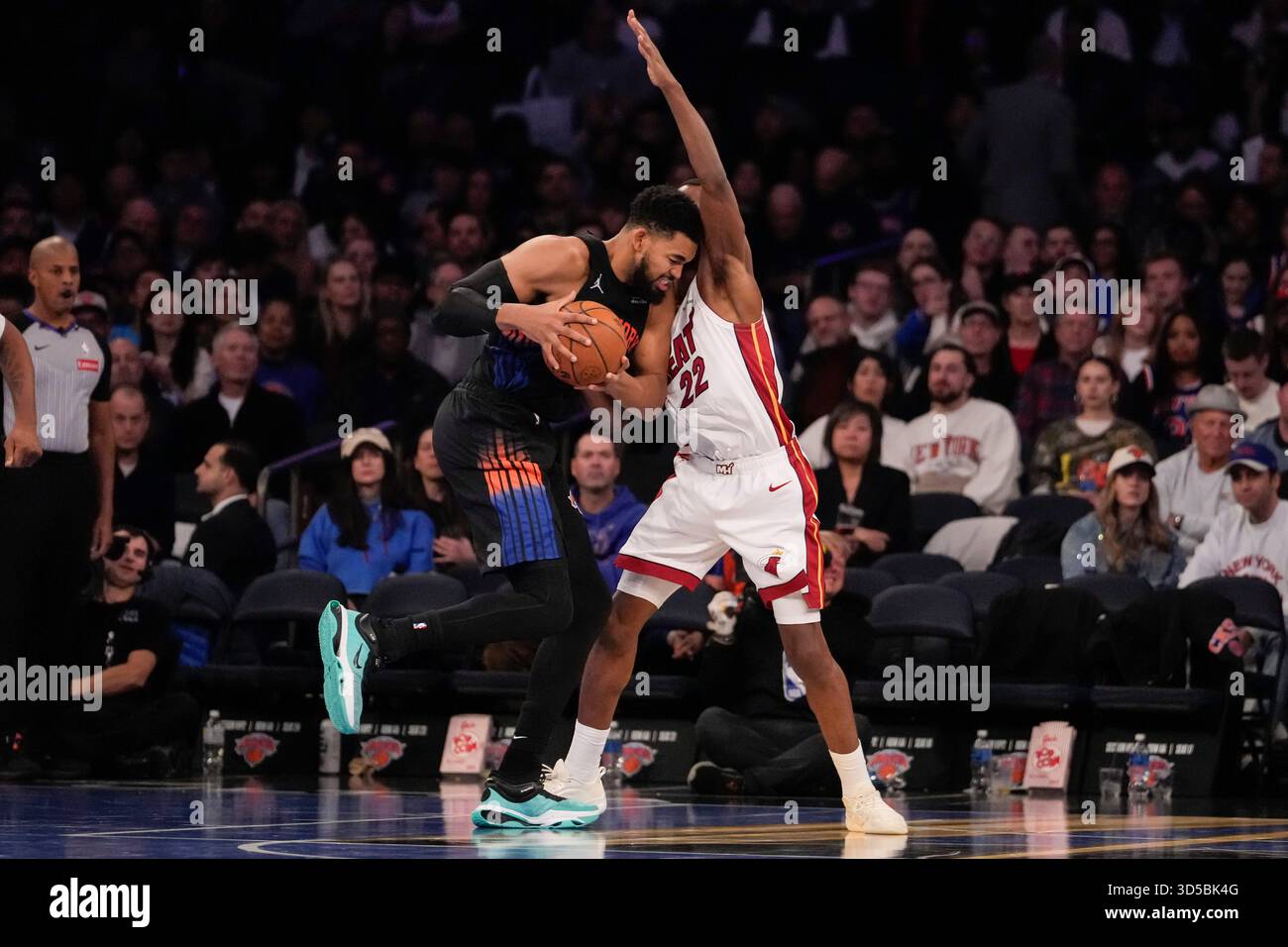 Miami Heat forward Andrew Wiggins (22) blocks New York Knicks center ...