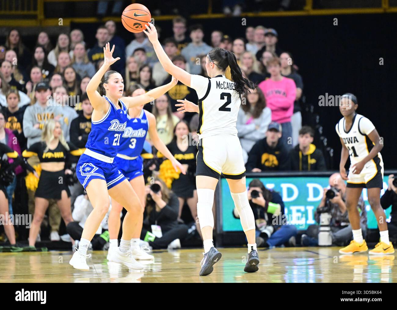 IOWA CITY, IA - NOVEMBER 13: Iowa guard Taylor McCabe (2) passes the ...