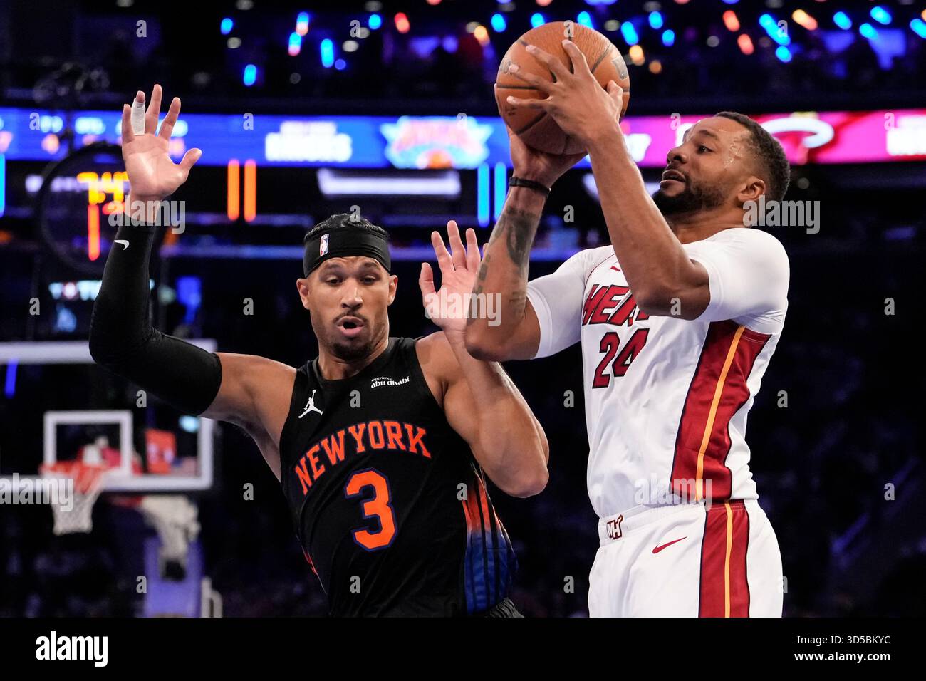 Miami Heat guard Norman Powell (24) looks to shoot over New York Knicks ...