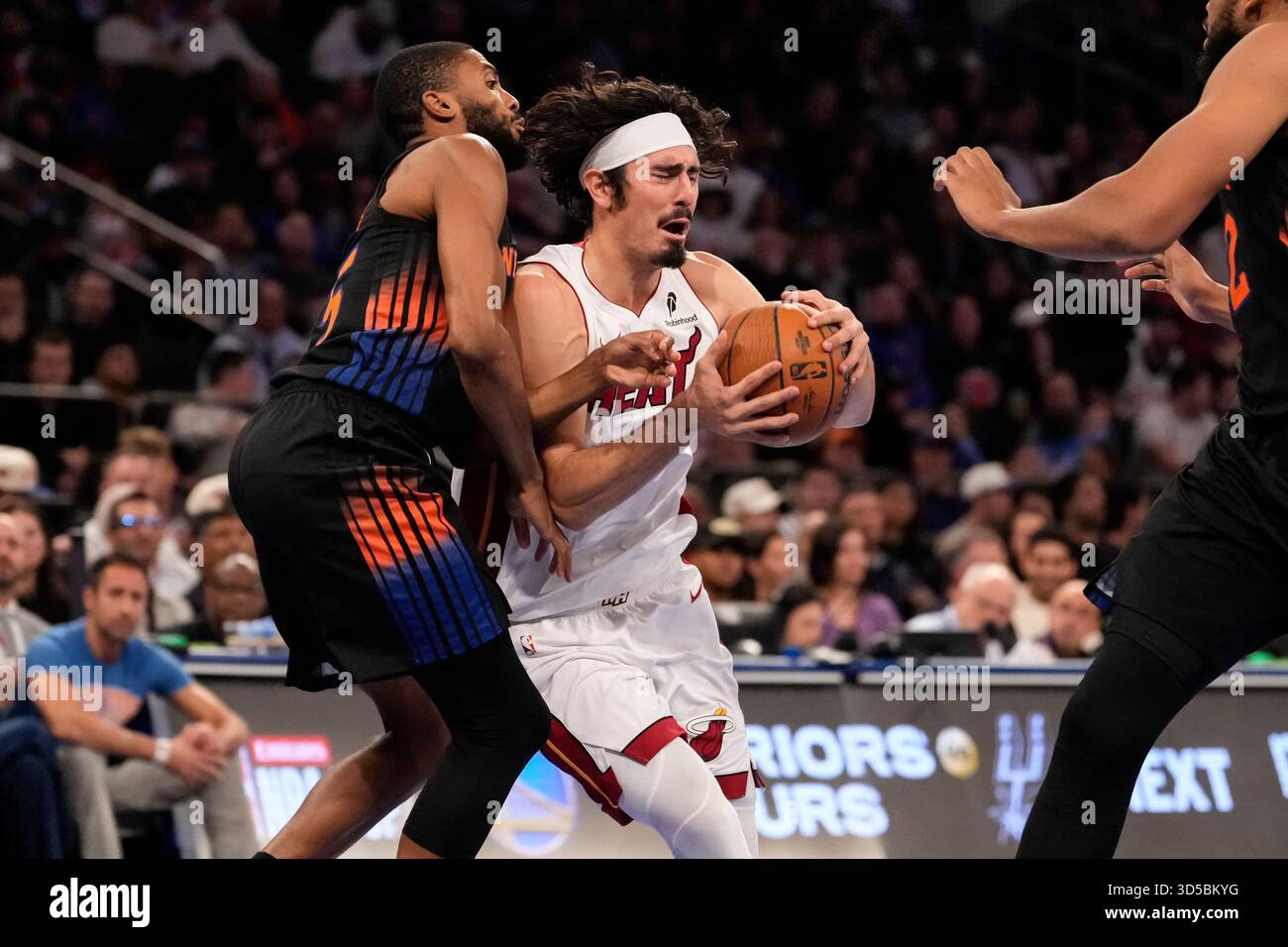 Miami Heat forward Jaime Jaquez Jr. (11) drives past Miami Heat guard ...