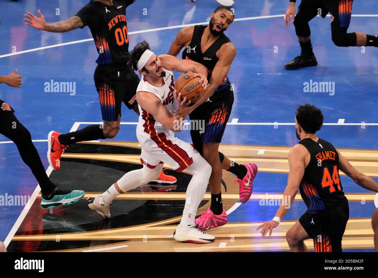 Miami Heat forward Jaime Jaquez Jr. drives past New York Knicks guard Mikal Bridges during the ...