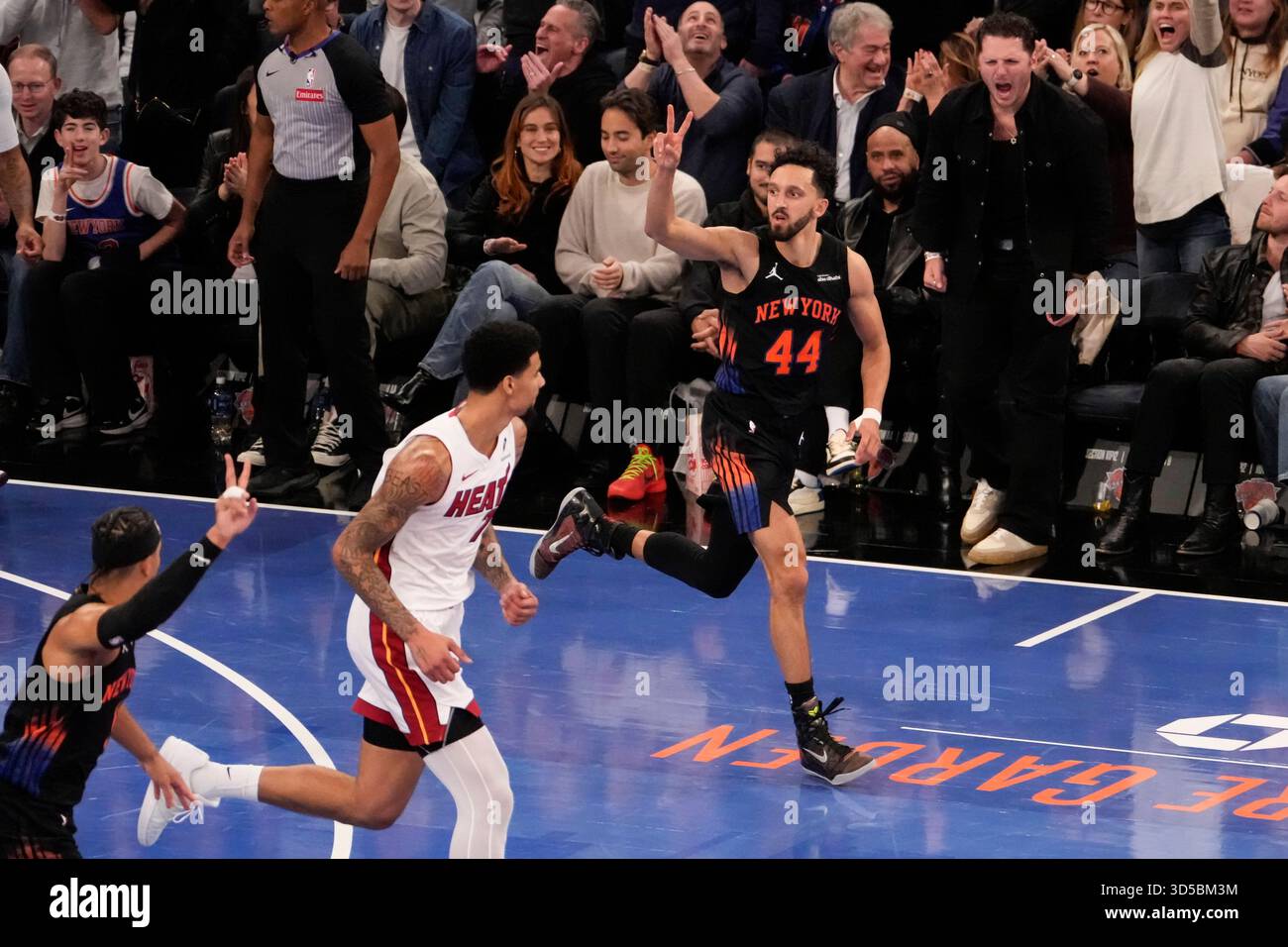 New York Knicks guard Landry Shamet (44) reacts after scoring a 3-point basket during the second ...