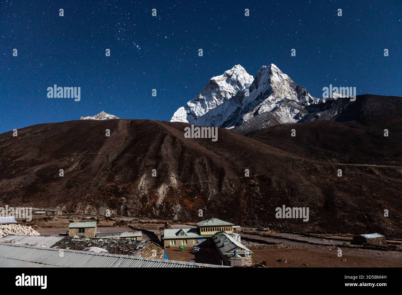 Ama Dablam mountain and the village at night. View from Chukhung valley ...