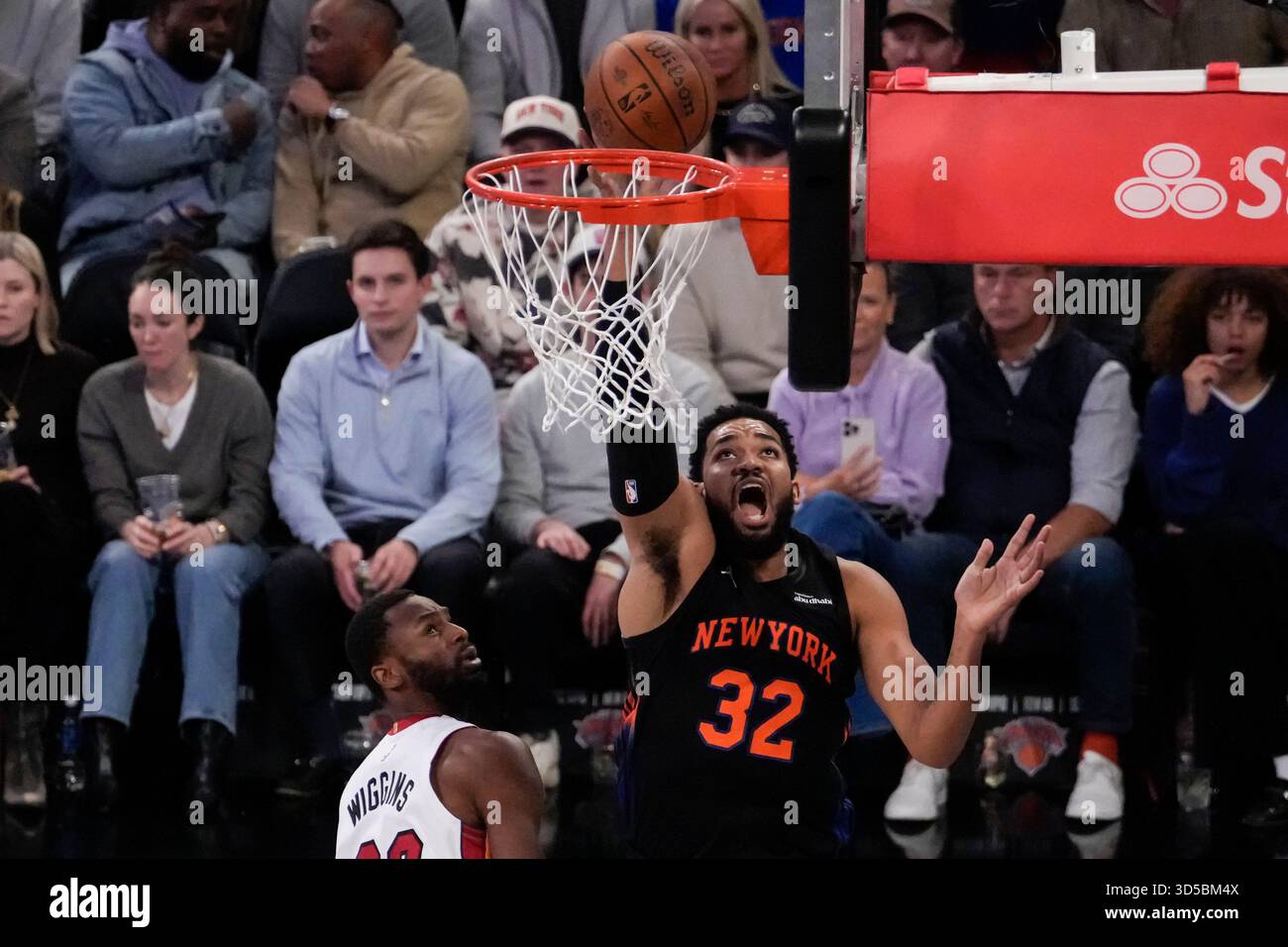 New York Knicks center Karl-Anthony Towns (32) shoots during the first ...