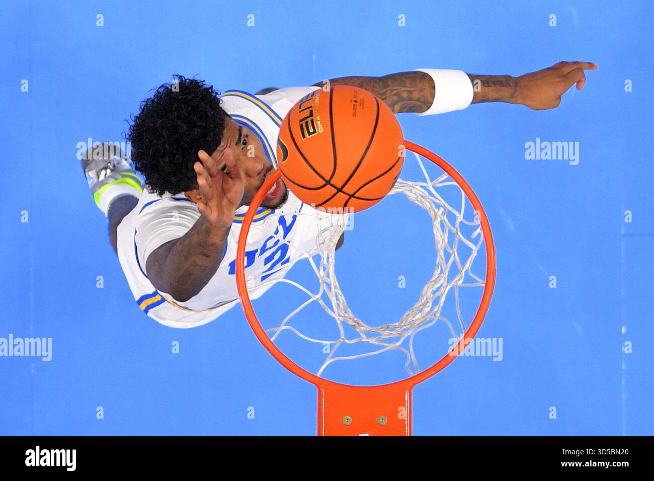 UCLA guard Donovan Dent shoots during the first half of a Hall of Fame ...