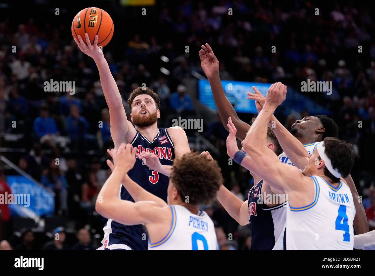 Arizona guard Anthony Dell'Orso (3) shoots as UCLA guard Trent Perry (0 ...