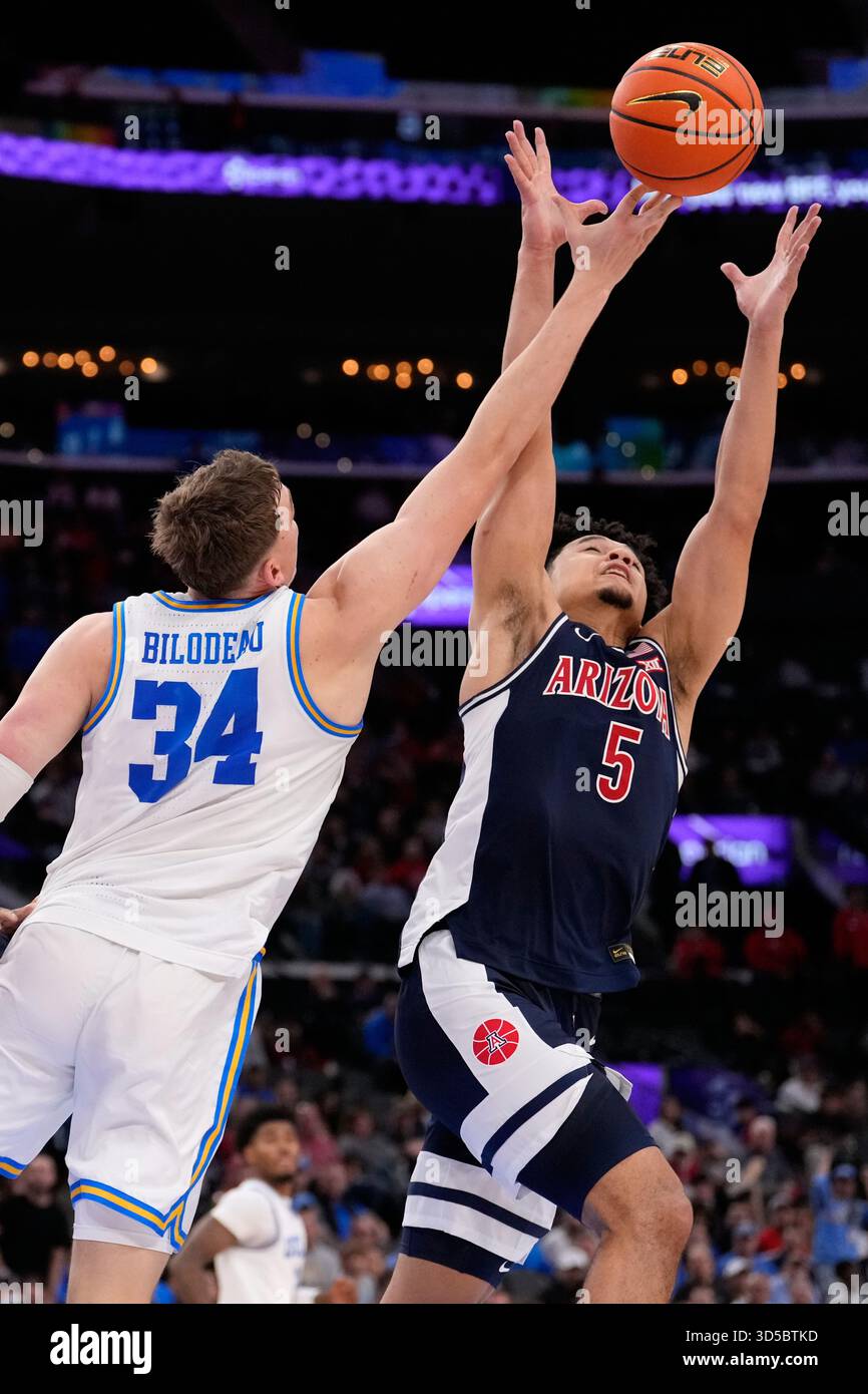 UCLA forward Tyler Bilodeau, left, and Arizona guard Brayden Burries ...
