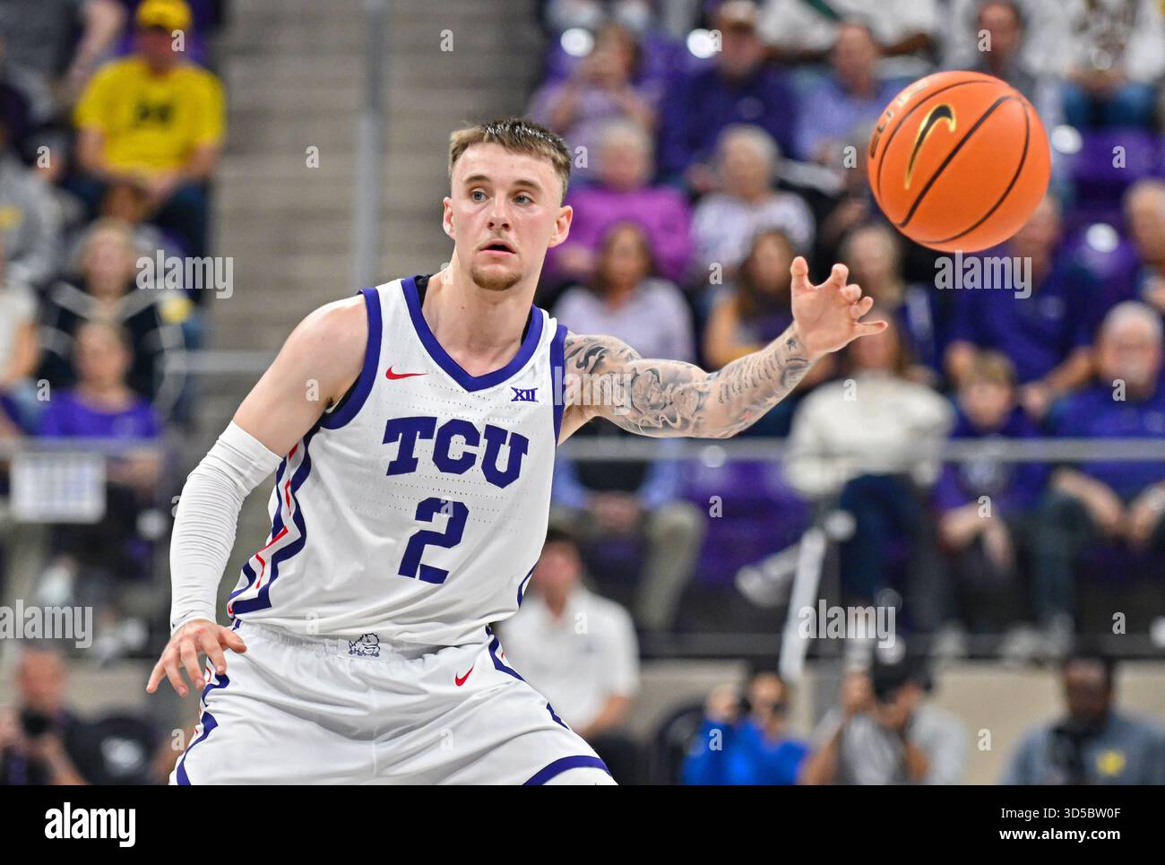 November 14, 2025: TCU Horned Frogs guard Brock Harding makes a pass ...