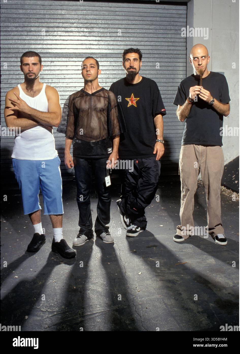 MIAMI FL - OCTOBER, 01: John Dolmayan, Daron Malakian, Serj Tankian and ...