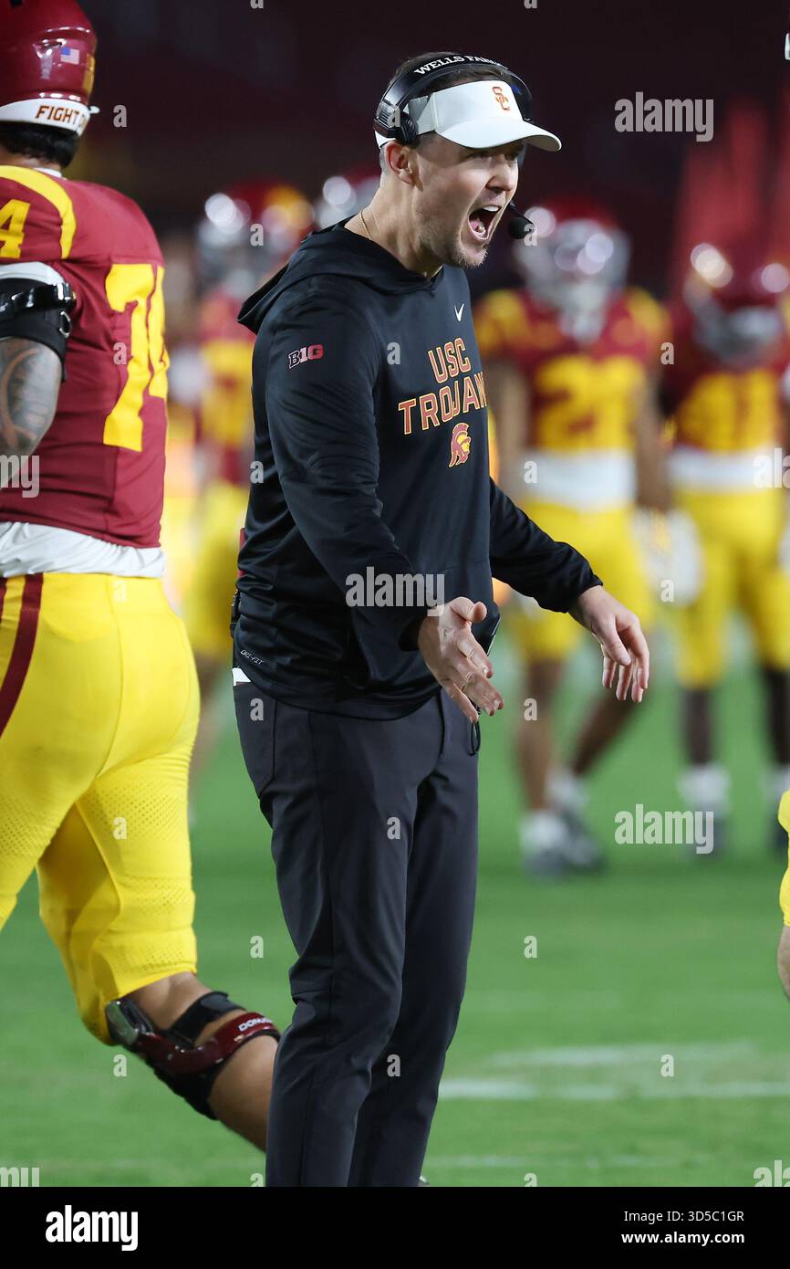 Southern California head coach Lincoln Riley encourages his players ...