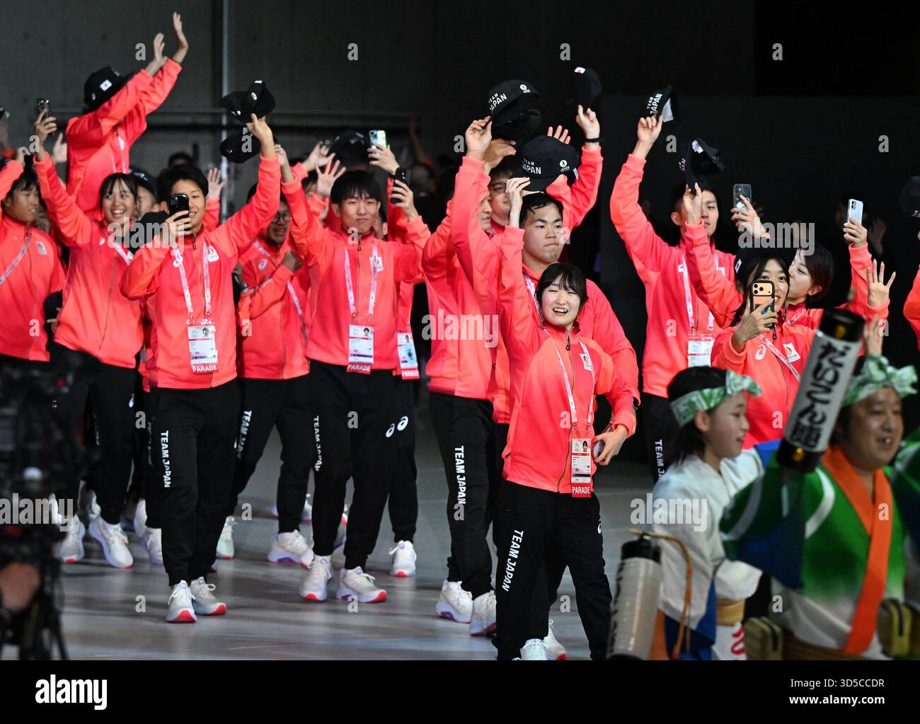 The Japanese delegation marches into the opening ceremony of the Tokyo ...