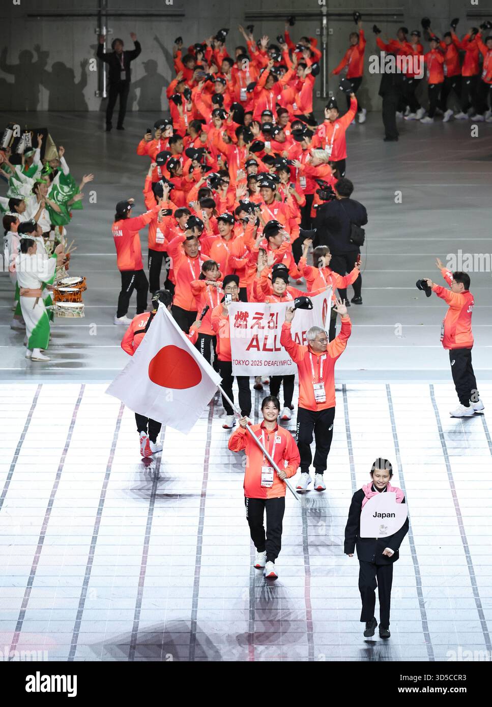 Flag bearer Ryo Ogura leads the Japanese delegation during the opening ...