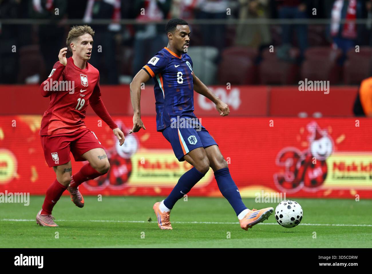 Michal Skoras of Poland and Ryan Gravenberch of Netherlands during the FIFA World Cup 2026 ...