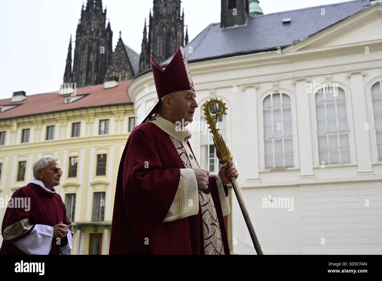 Prague Archbishop Jan Graubner (right) arrives for the funeral of ...