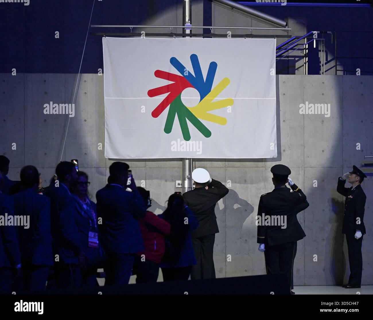 The Deaflympics flag is raised at the opening ceremony of the Tokyo ...