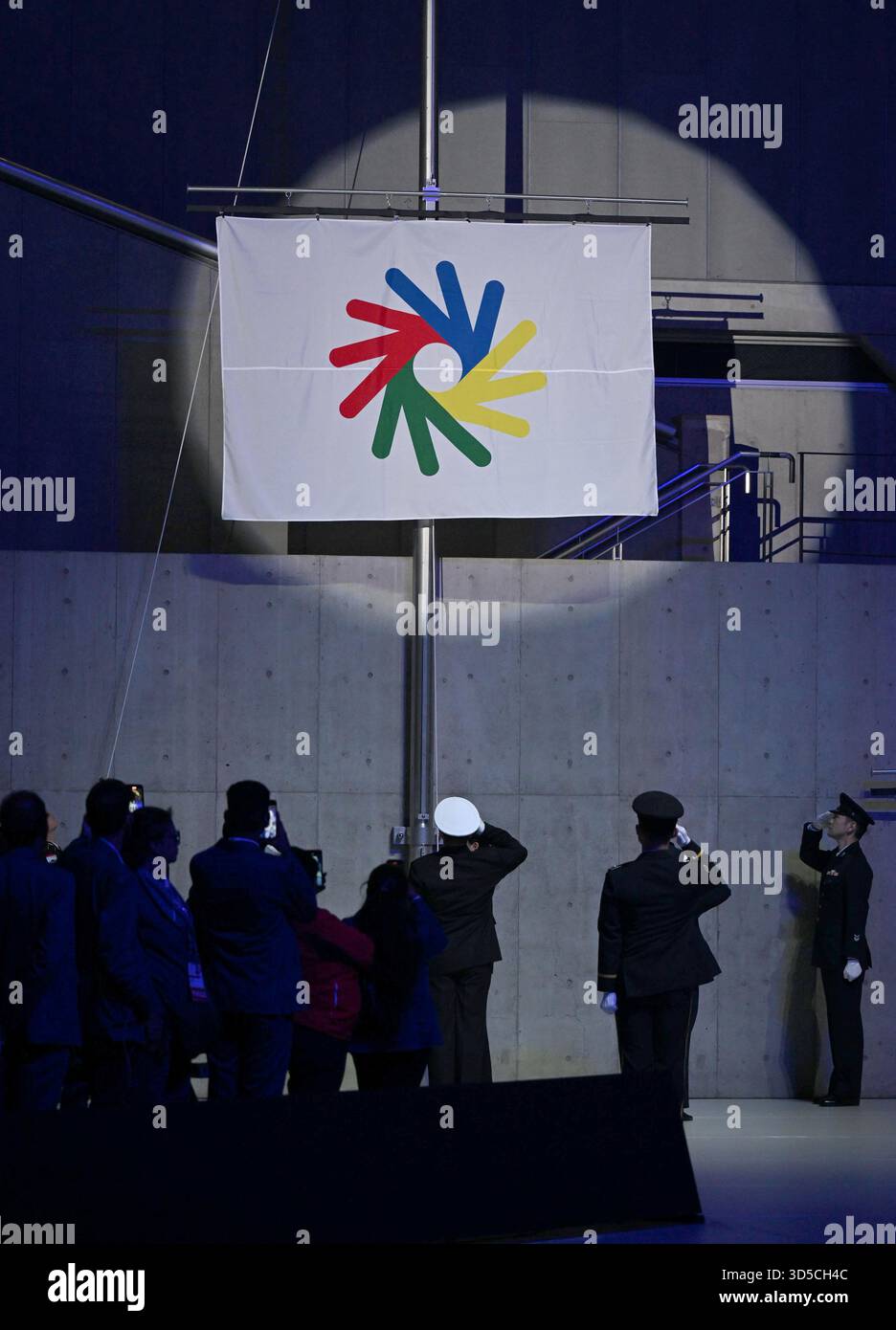 The Deaflympics flag is raised at the opening ceremony of the Tokyo ...