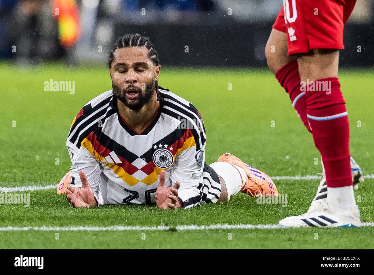 Serge Gnabry (Germany, 20) frustrated on the ground after a duel FIFA ...