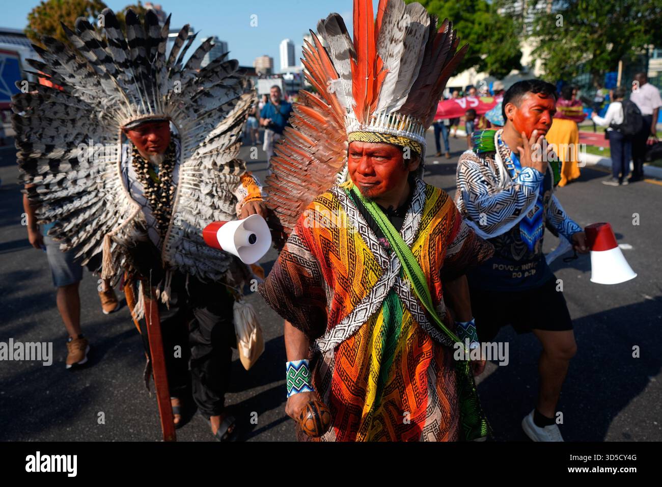 Indigenous activists arrive to participate in a climate protest during ...