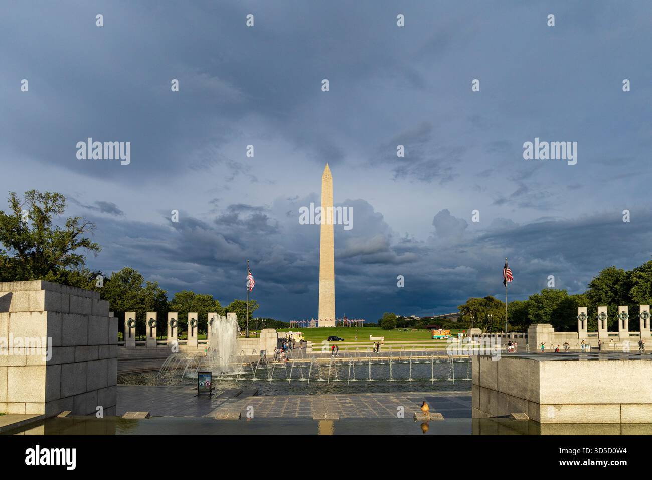 The World War II Memorial with two pillars are decorated with wreaths ...