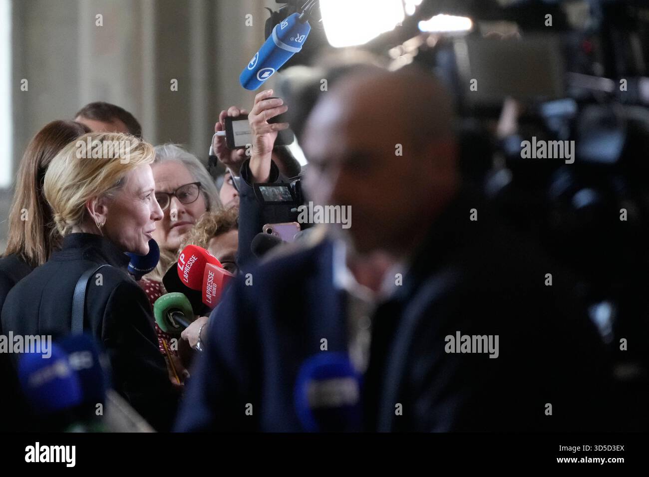 Cate Blanchett is interviewed by journalists as she leaves at the end ...
