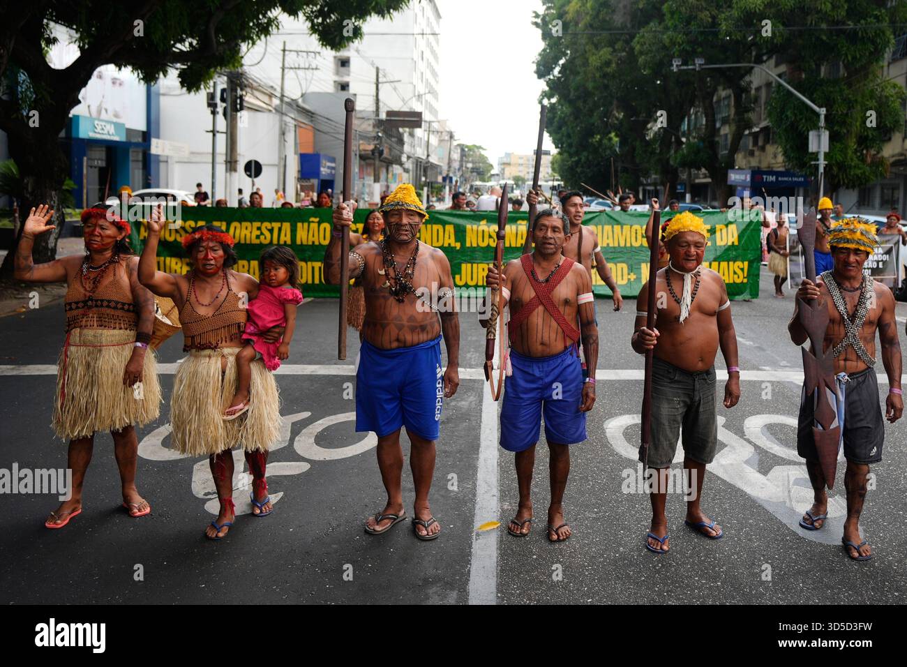 Indigenous activists participate in a climate protest during the COP30 ...