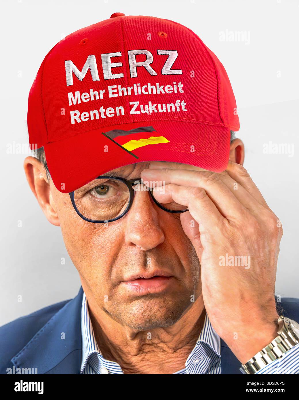 Bundeskanzler Friedrich Merz mit Basecap und Slogan MERZ Mehr ...