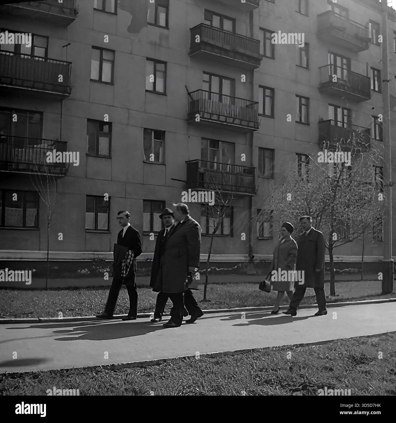 This archival B&W photograph from 1970 captures a city tour for the ...