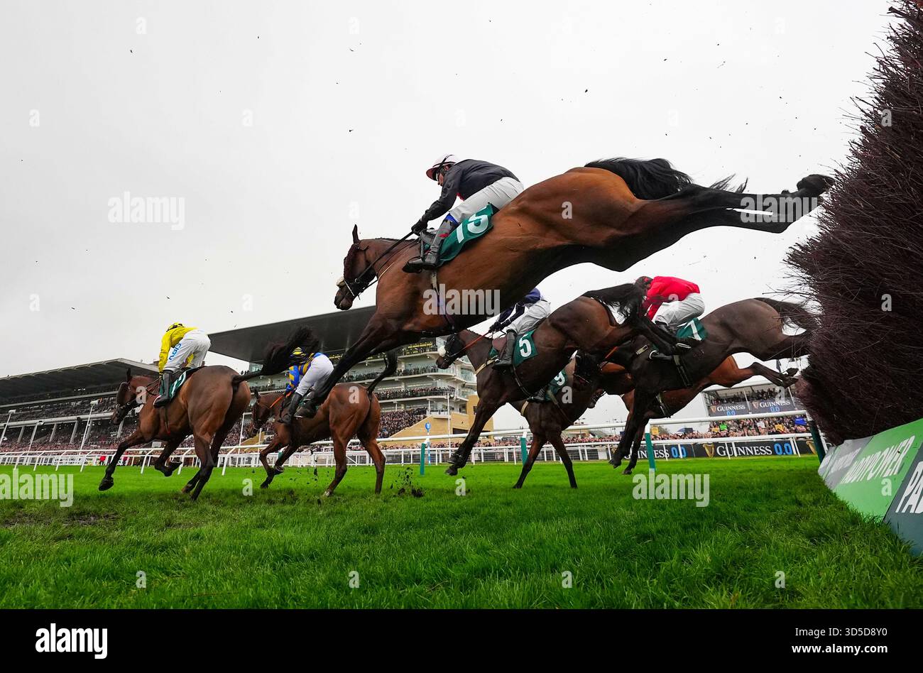 Runners and riders clear a fence during the Debenhams Amateur Jockeys ...