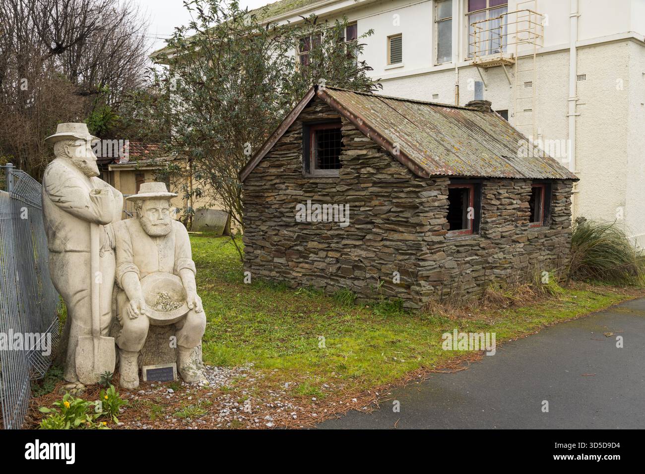 A replica of a stone gold miner's hut and statues of nineteenth-century ...