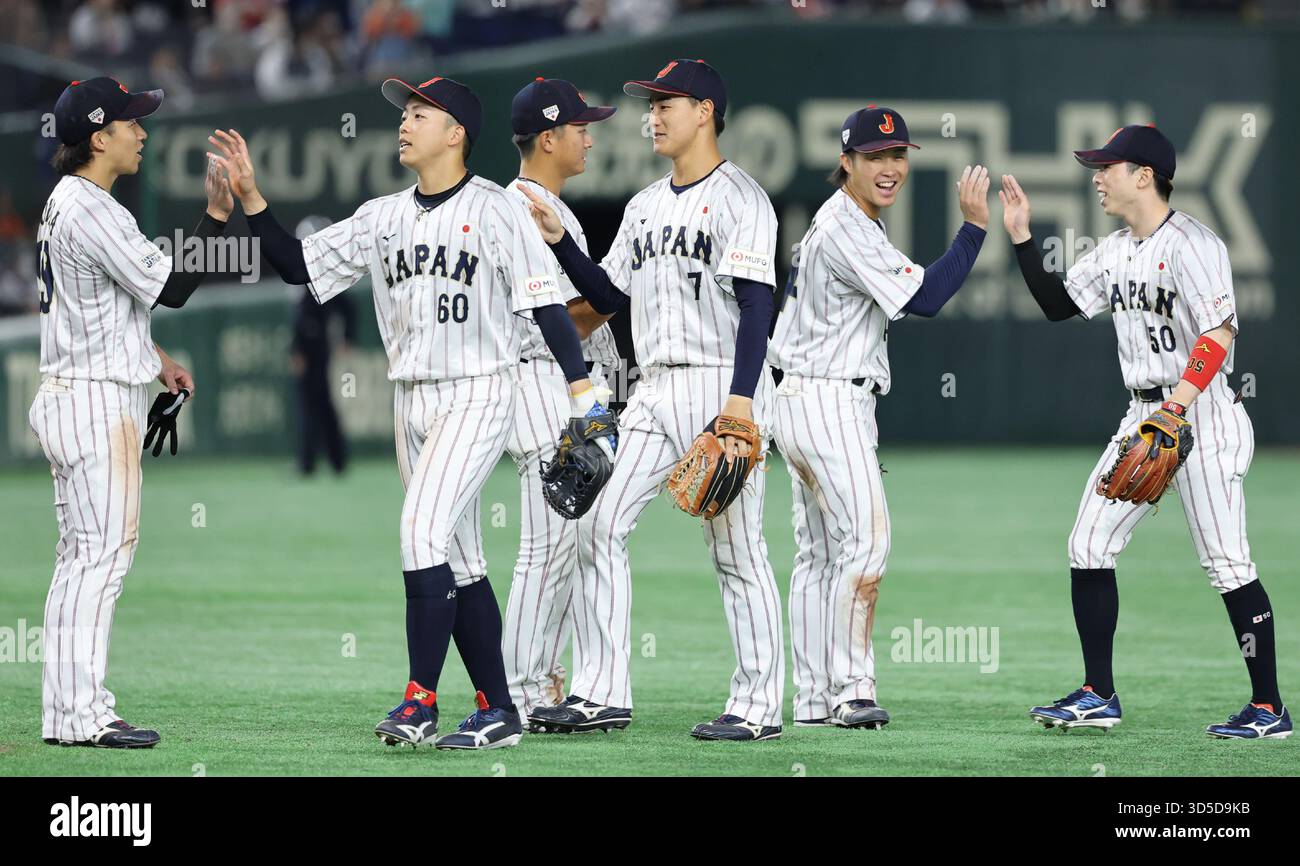 Players of the Japan national baseball team celebrate after winning the ...