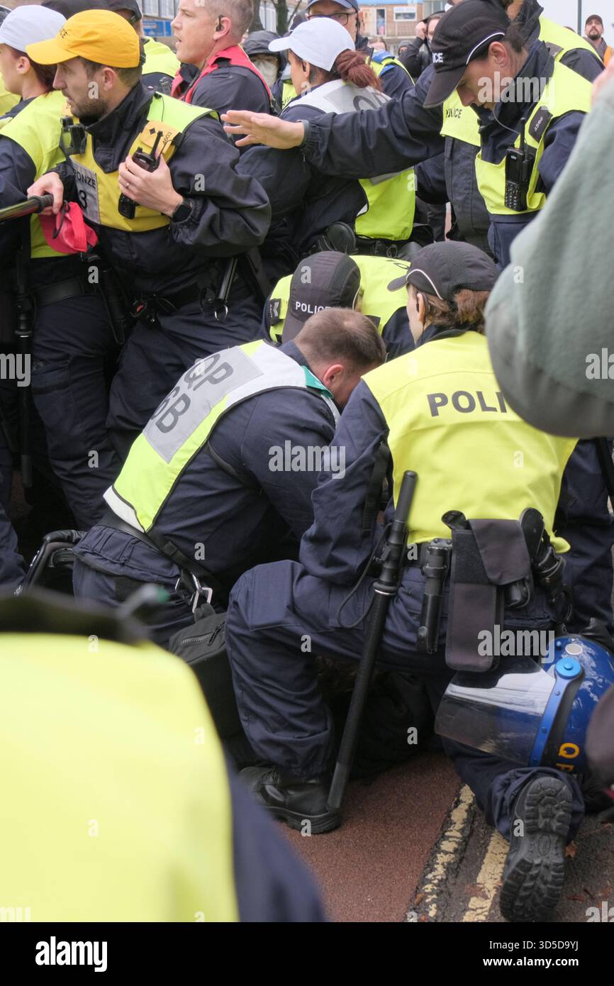 Bristol, UK 15th November 2025. After a scuffle a young man was taken ...