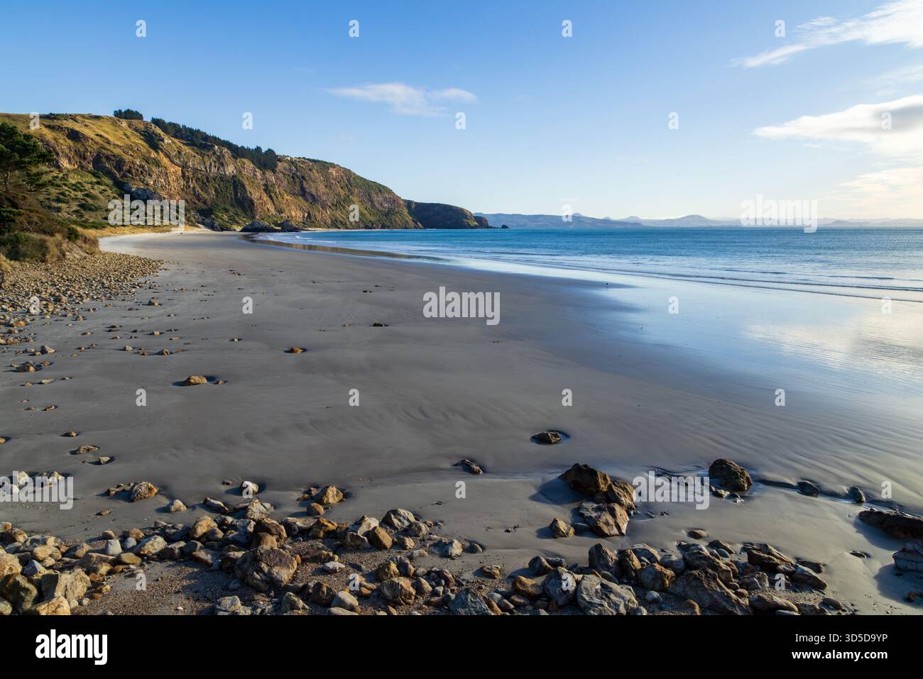 Long, sandy Aramoana Beach on the Otago Peninsula in New Zealand's ...