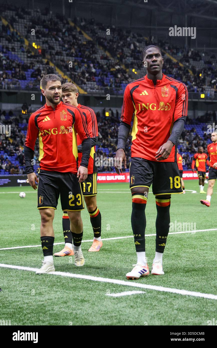 Belgium's Nicolas Raskin and Belgium's Amadou Onana pictured in action ...