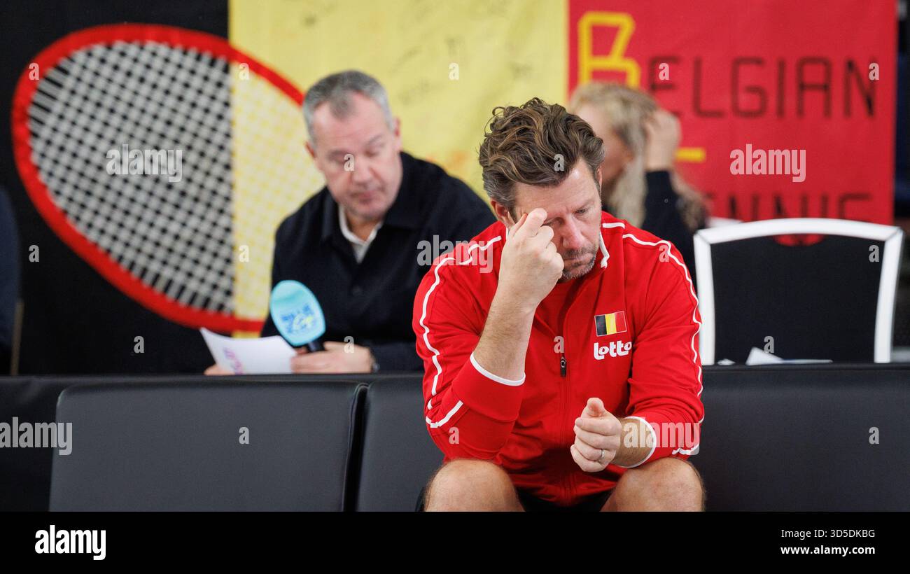 Belgian team captain Wim Fissette looks dejected during the first game ...