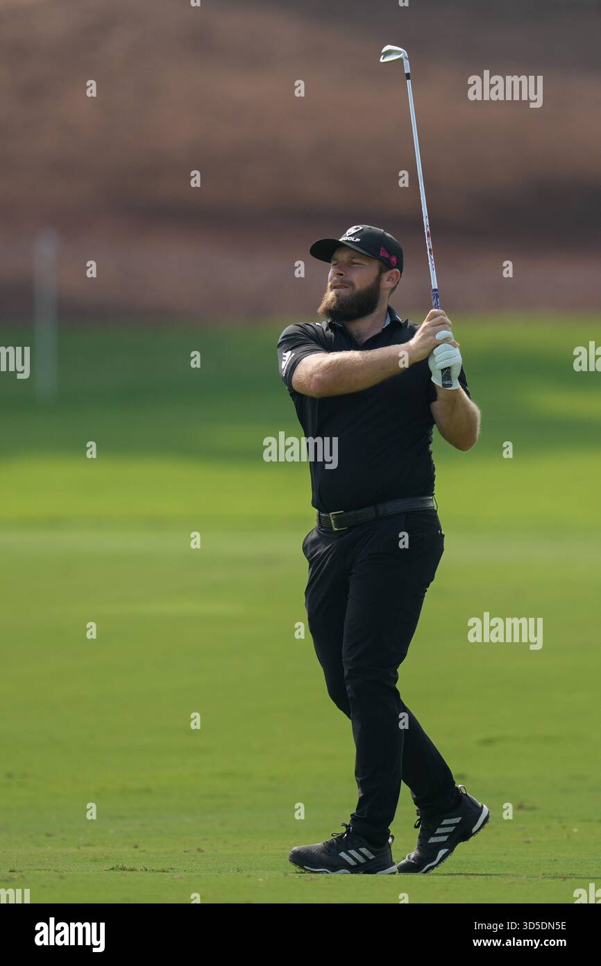 Tyrrell Hatton of England plays his second shot on the 9th hole during ...