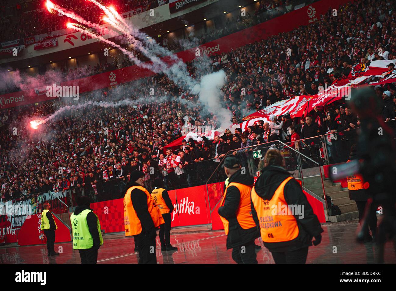 Warsaw, Poland. 14th November, 2025. Poland national team fans throwing ...